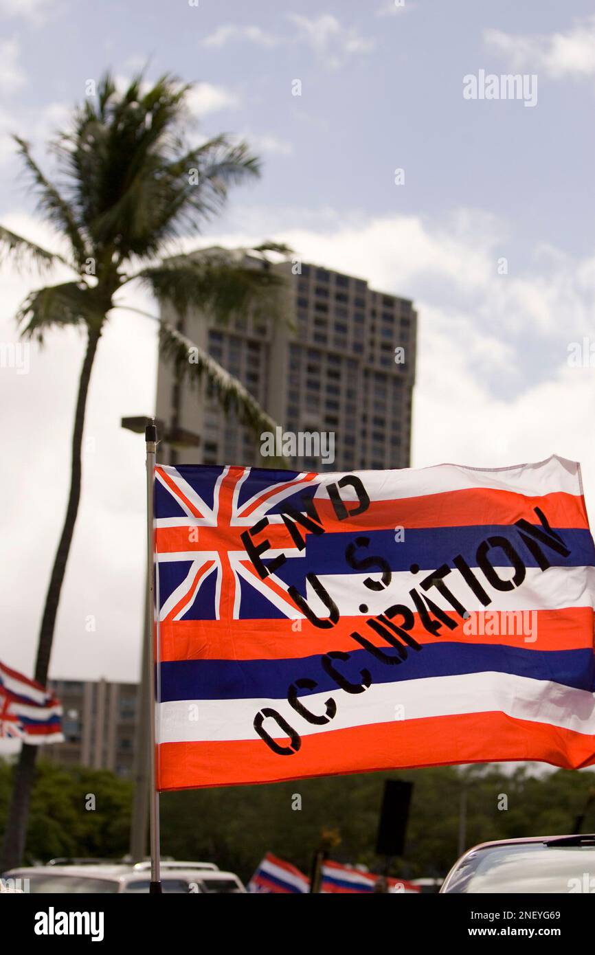 Native Hawaiian activists hold a protest flag during a Hawaiian ...