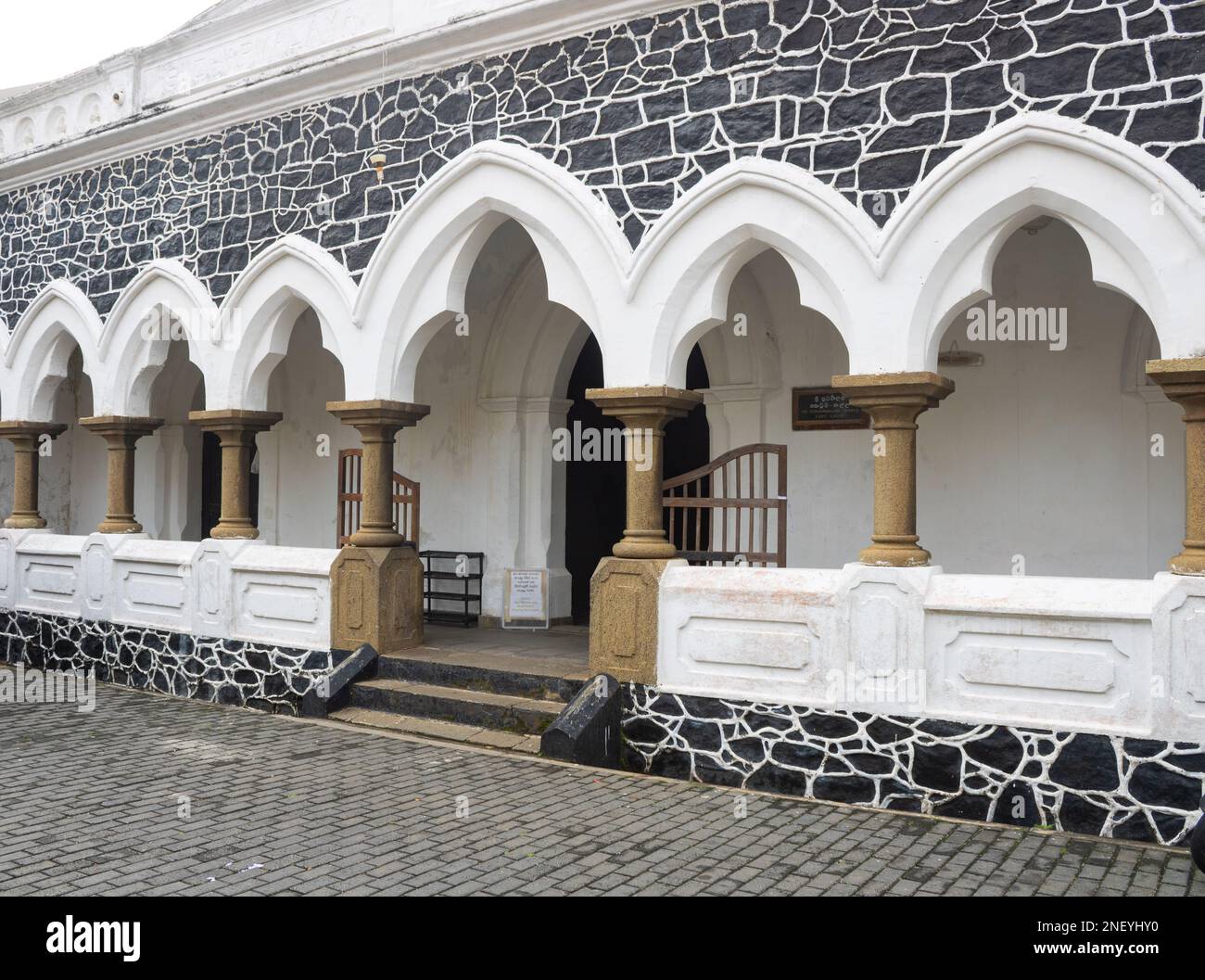 beautiful symmetrical arch pattern front view of old temple inside the ...