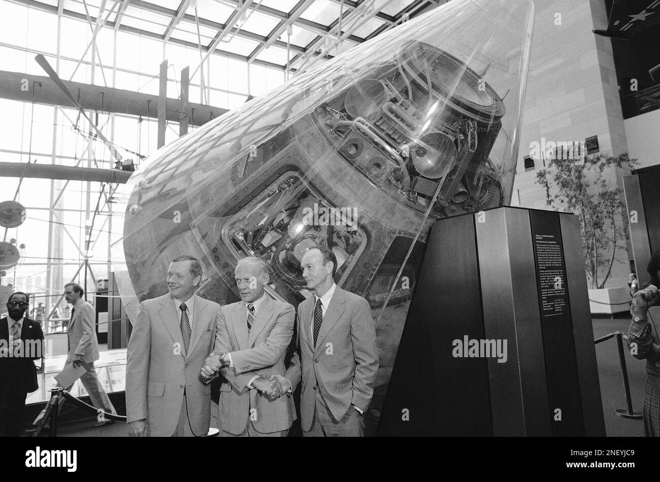 The Apollo 11 astronauts stand beside their spaceship Columbia the 10th ...