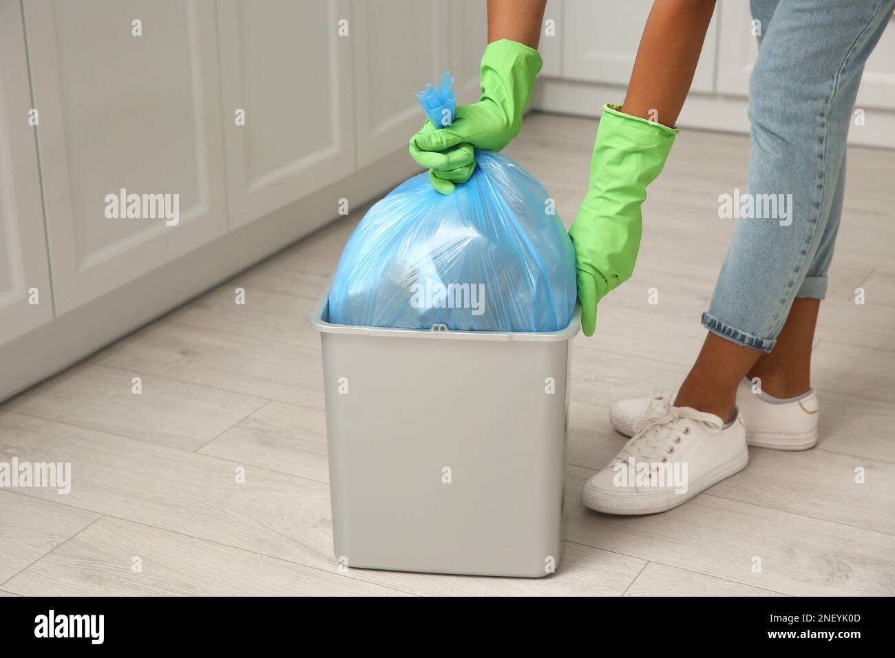 Taking out rubbish female hi-res stock photography and images - Alamy