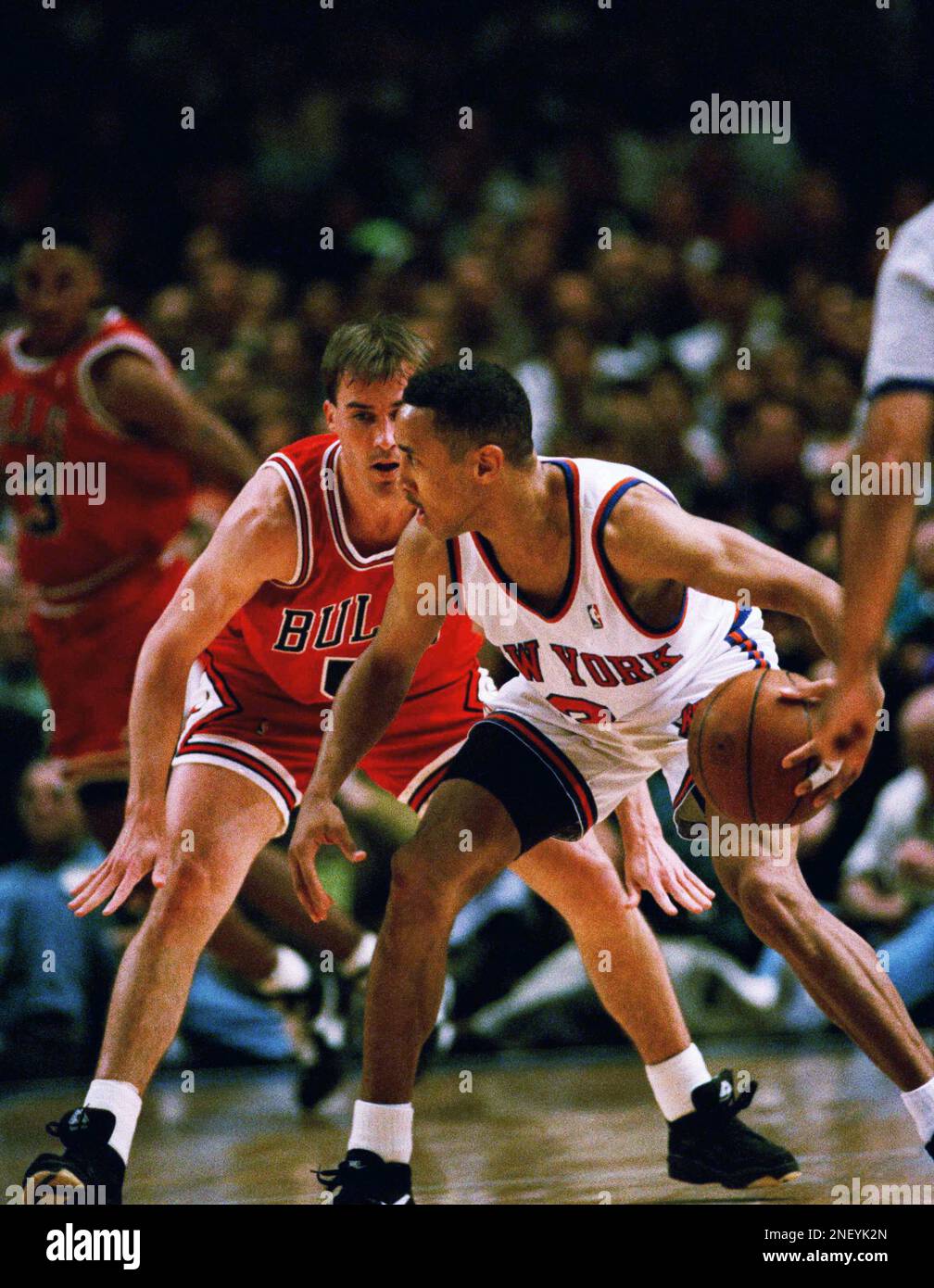 New York Knicks John Starks is guarded by Chicago Bulls John Paxson in ...