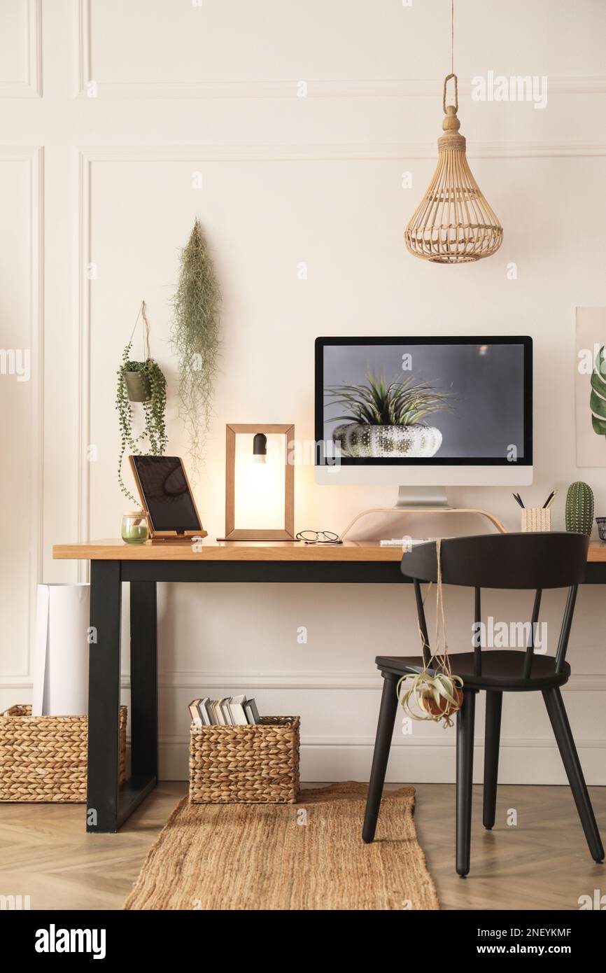 Modern workplace with computer in room. Interior design Stock Photo - Alamy