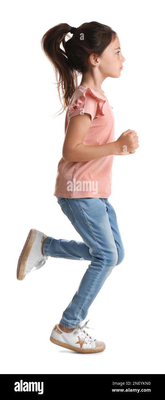 Cute little girl running on white background Stock Photo - Alamy