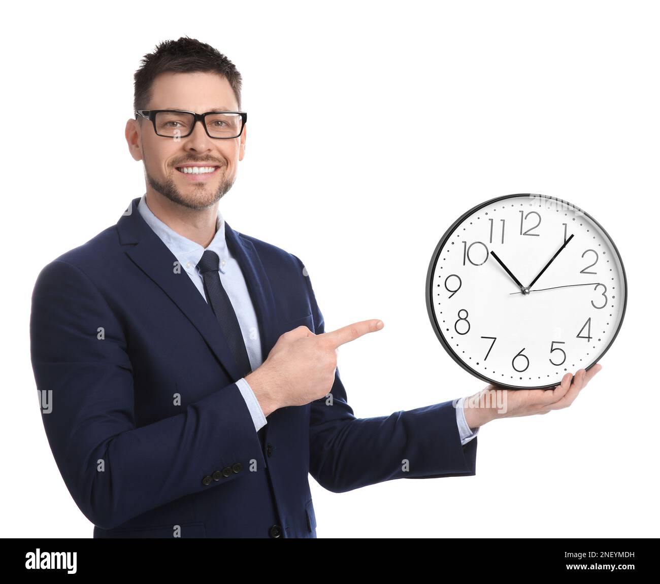 Happy businessman pointing on clock against white background. Time ...