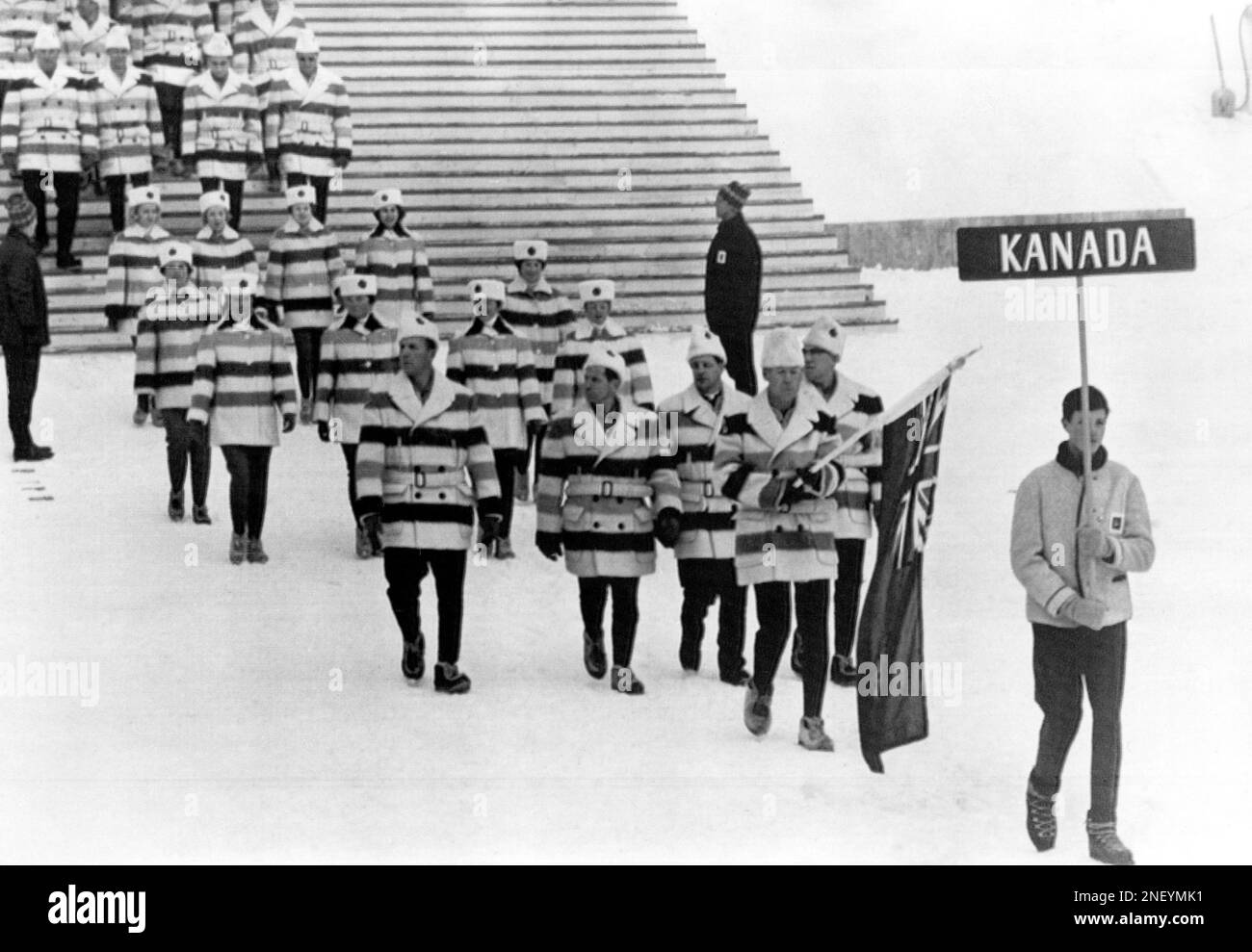 Members of the Canadian winter Olympic team enters Bergisel ski stadium ...