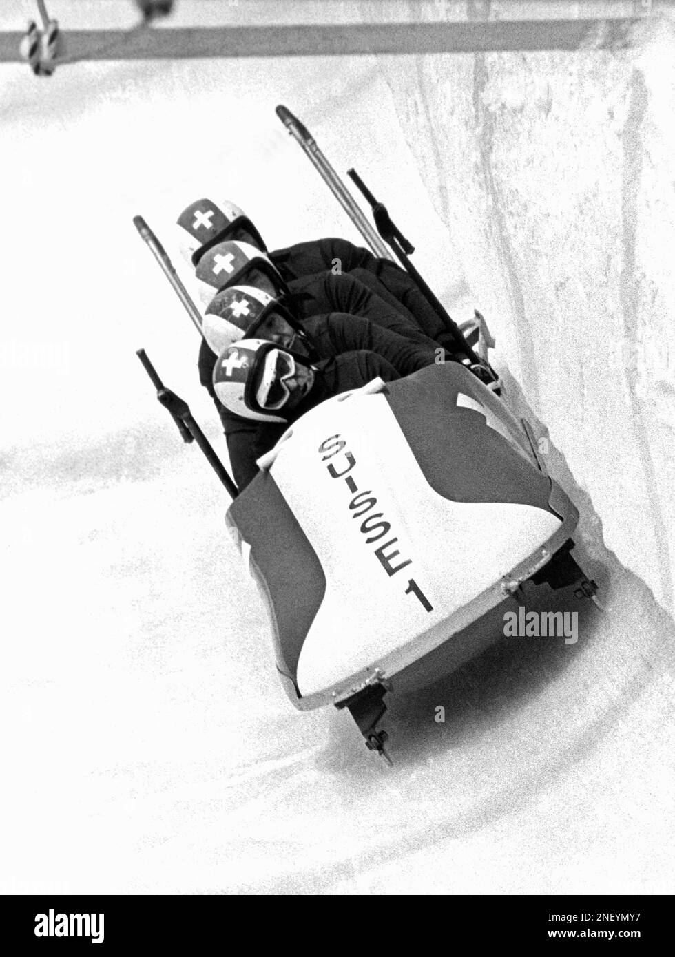 Jean Wicki drives the Switzerland number one sled to a gold medal in ...