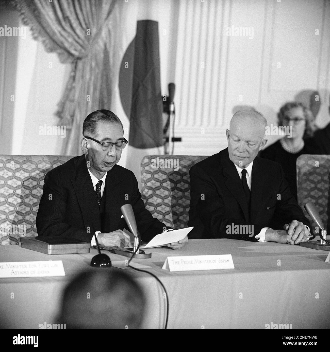 Japan's Prime Minister Nobusuke Kishi reads a statement at treaty ...