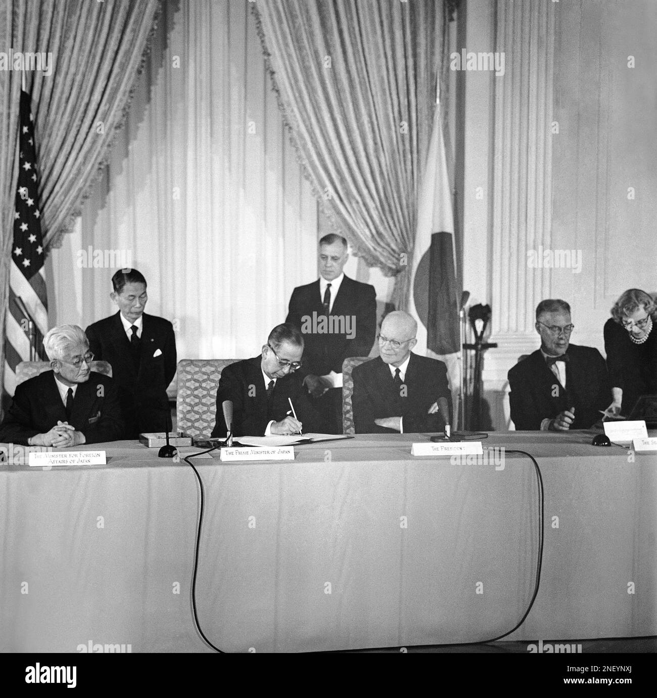 Prime Minister Nobusuke Kishi of Japan signs the U.S. - Japan security ...