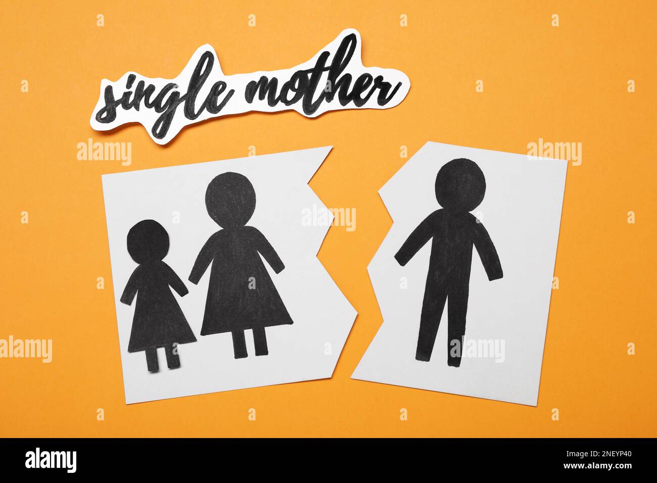 Being single mother after divorce concept. Paper cutouts demonstrating ...