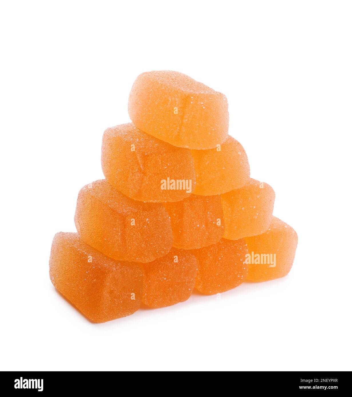 Pyramid made with tasty orange jelly candies on white background Stock ...