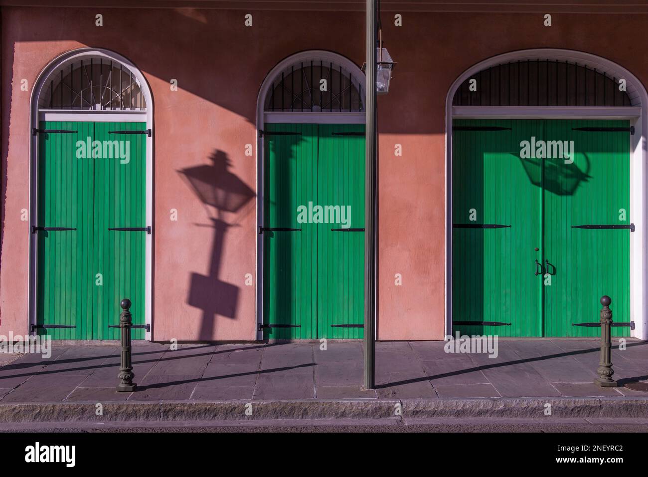Three green doors lamp shadow New Orleans, Louisiana, USA. The Big Easy ...