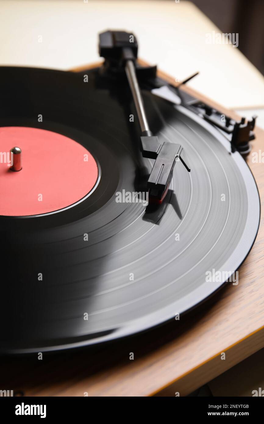 Modern vinyl record player with disc, closeup Stock Photo - Alamy