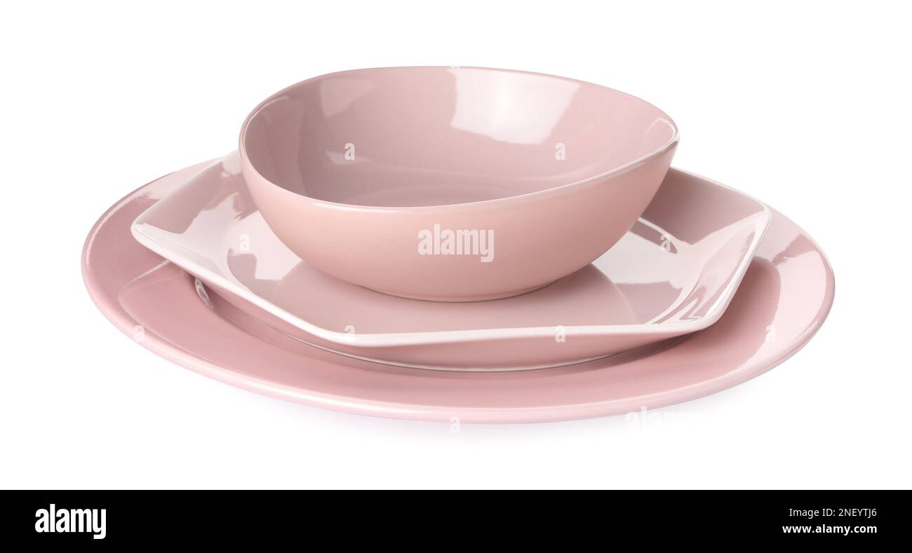 Stack of clean dishes on white background Stock Photo - Alamy