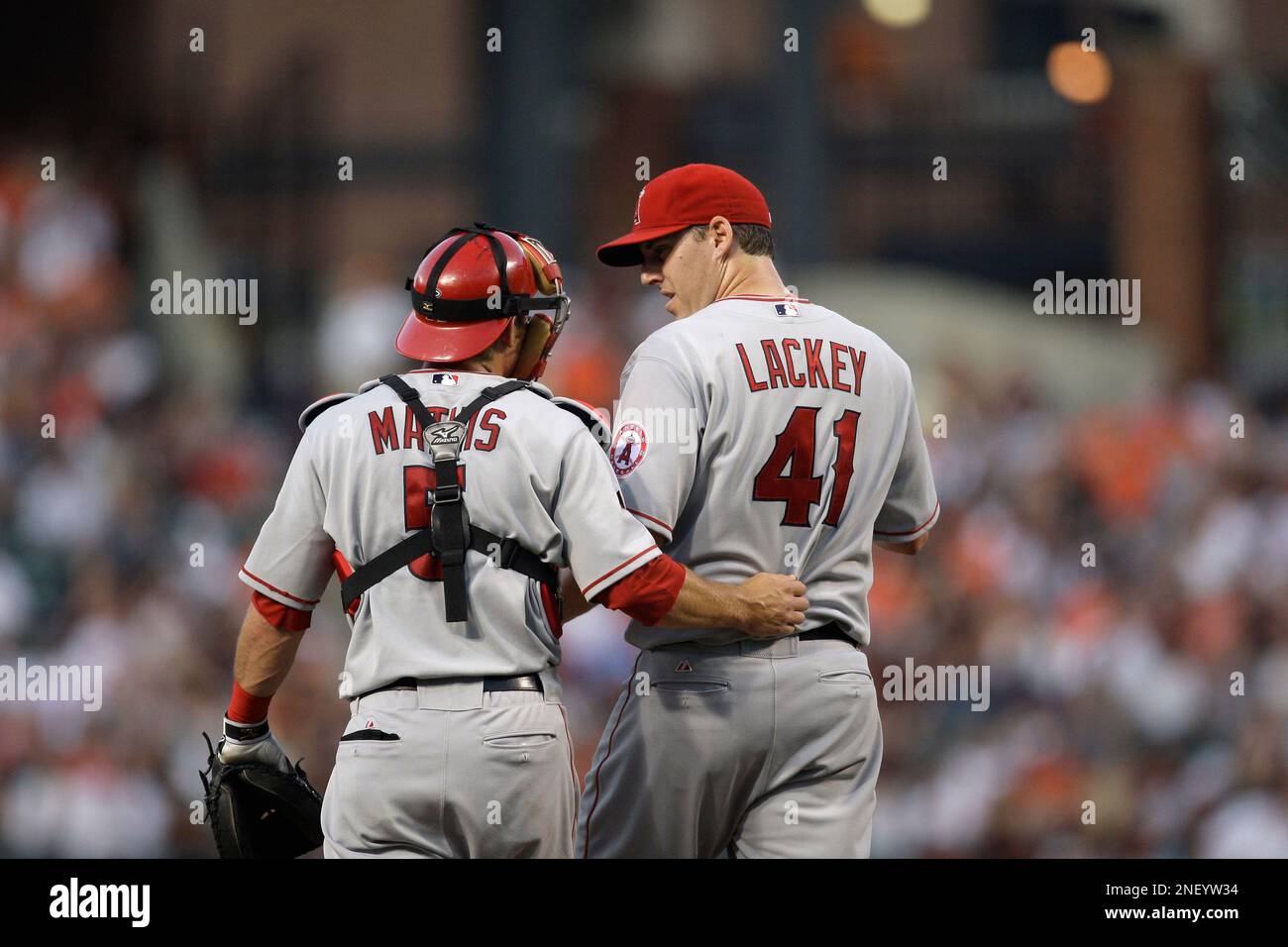 Los Angeles Angels catcher Jeff Mathis, left, talks with Los Angeles ...