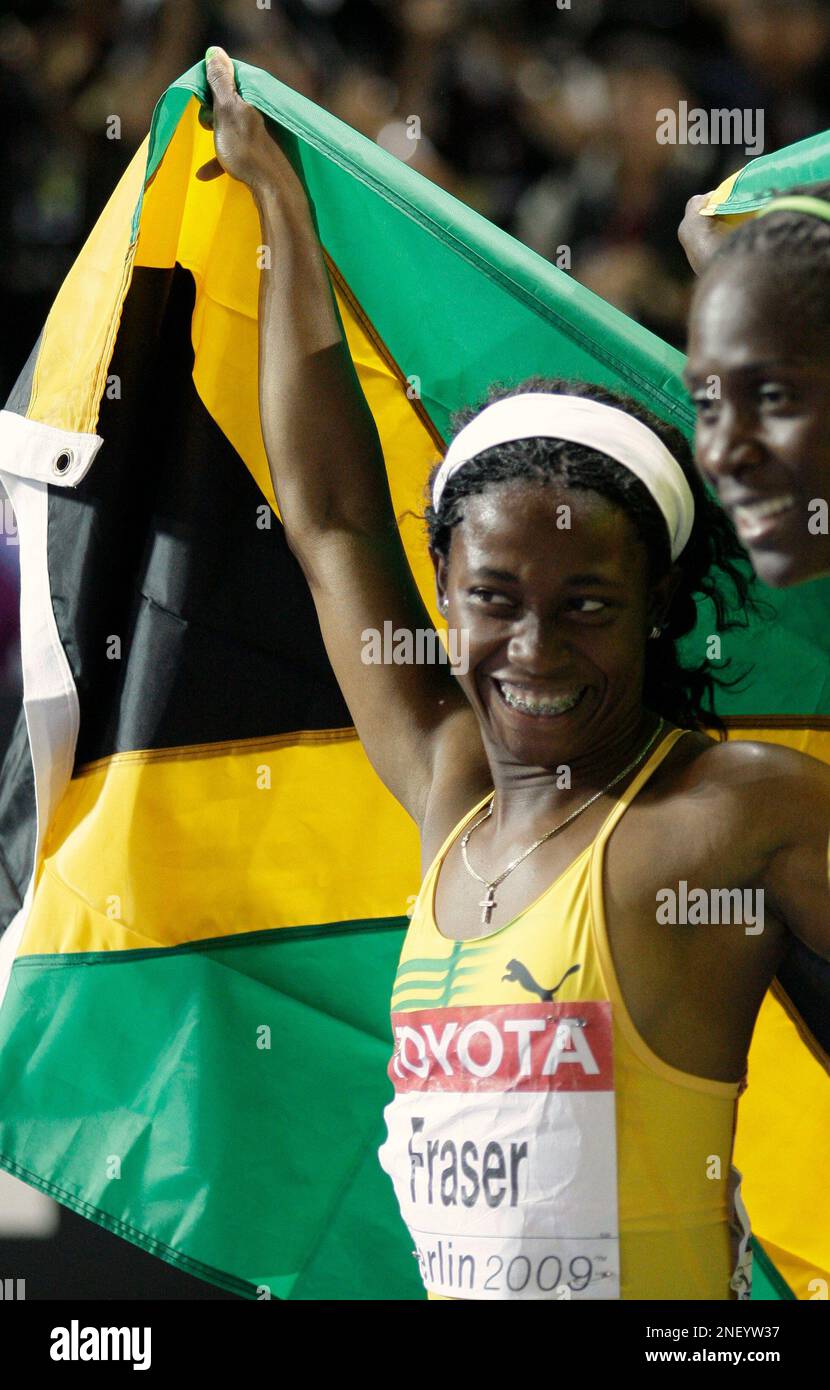 Jamaica's Shelley-Ann Fraser celebrates after winning the gold medal in ...