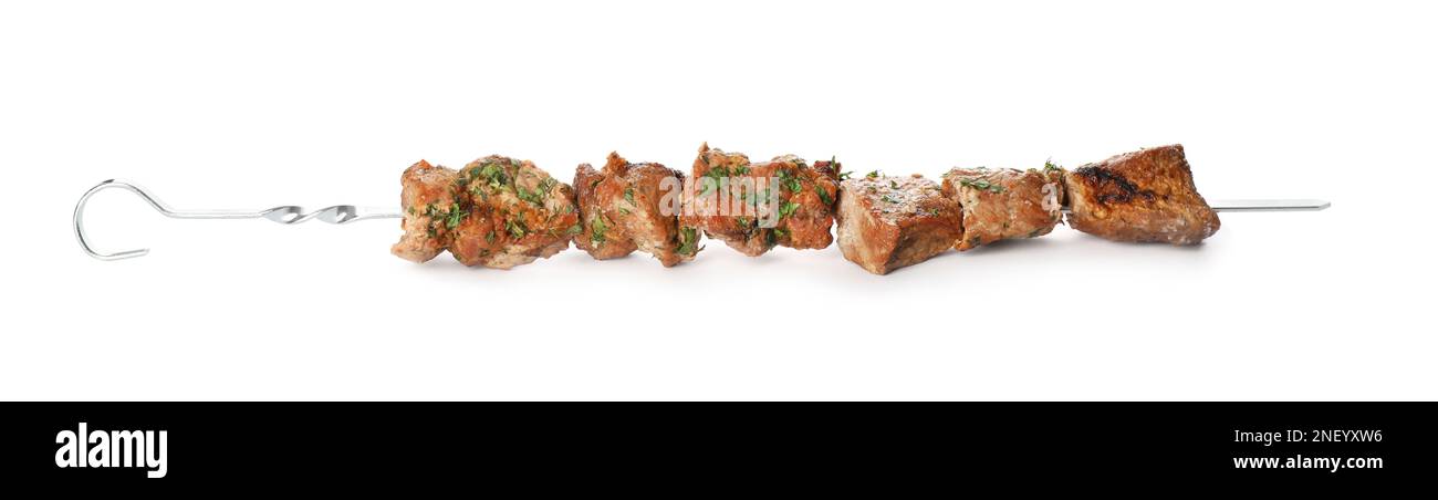 Metal skewer with delicious meat on white background Stock Photo - Alamy