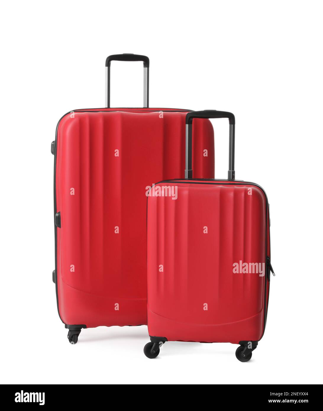 Red suitcases for travelling on white background Stock Photo - Alamy