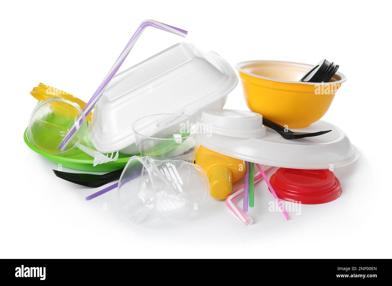 Pile of different plastic items on white background Stock Photo - Alamy