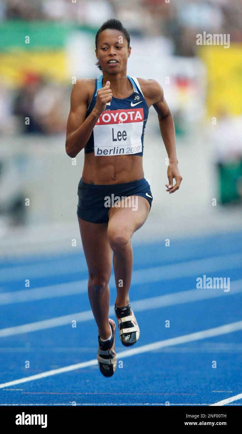 United States' Muna Lee competes in a Women's 100m first round heat ...