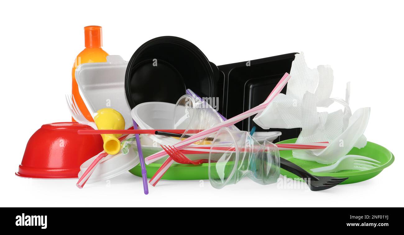 Pile of different plastic items on white background Stock Photo - Alamy