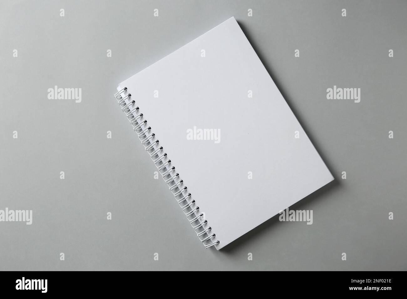 Blank notebook on grey background, top view. Mockup for design Stock ...