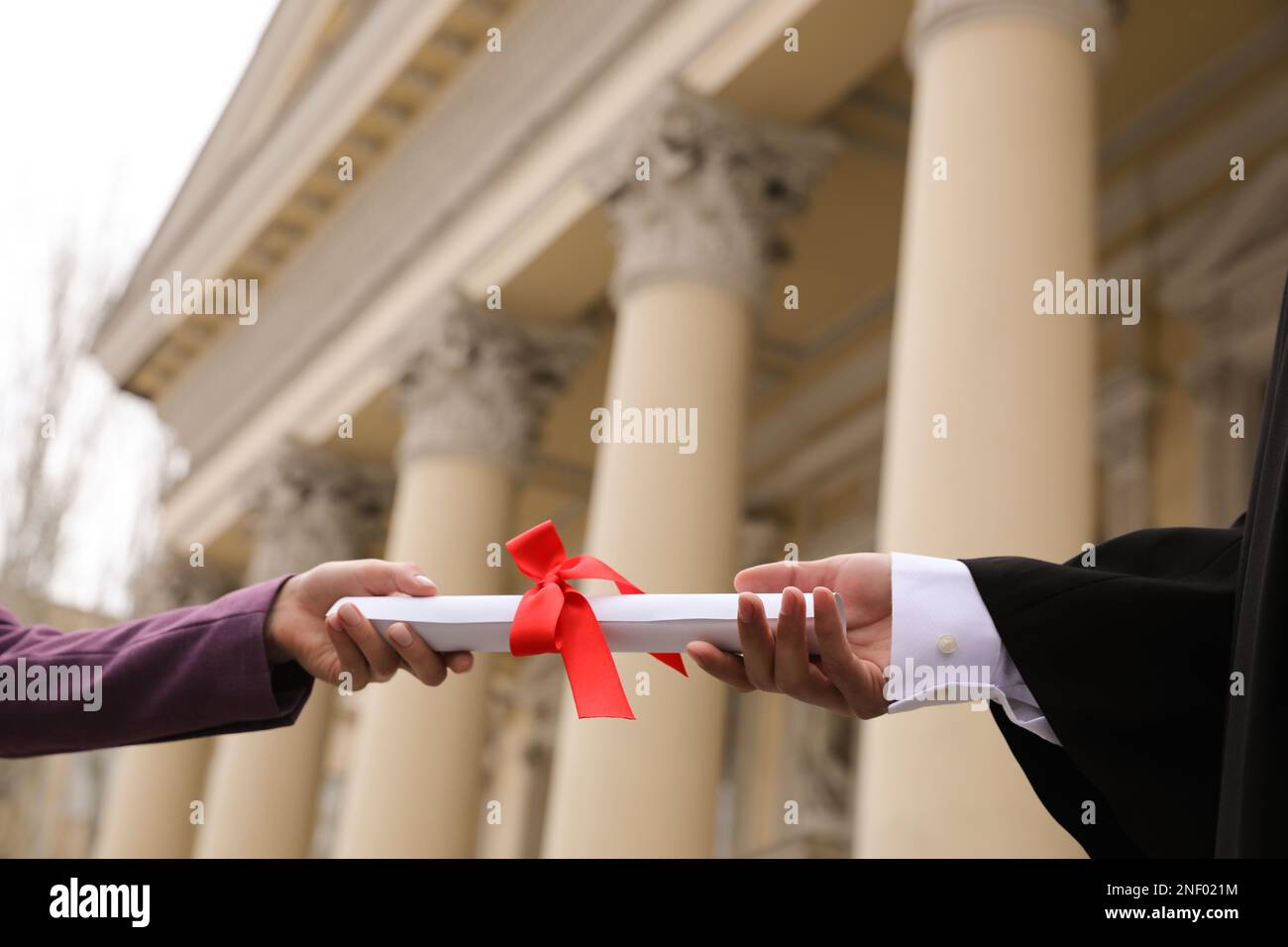 Receiving diploma hi-res stock photography and images - Alamy