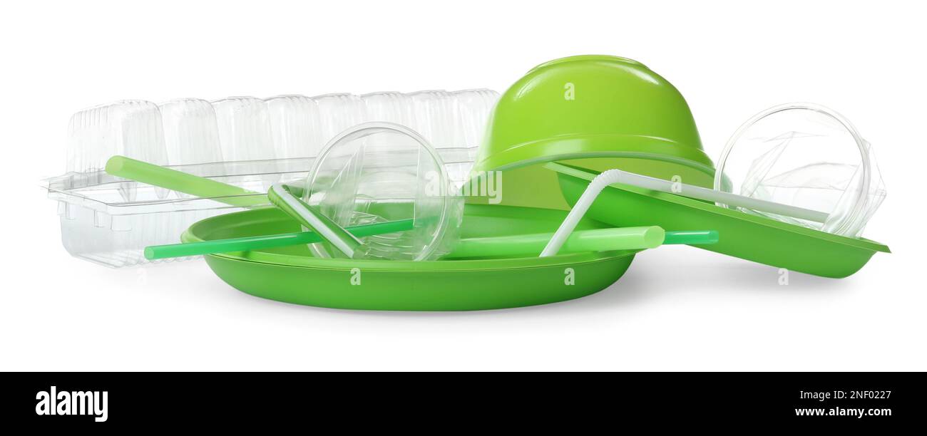 Pile of different plastic items on white background Stock Photo - Alamy