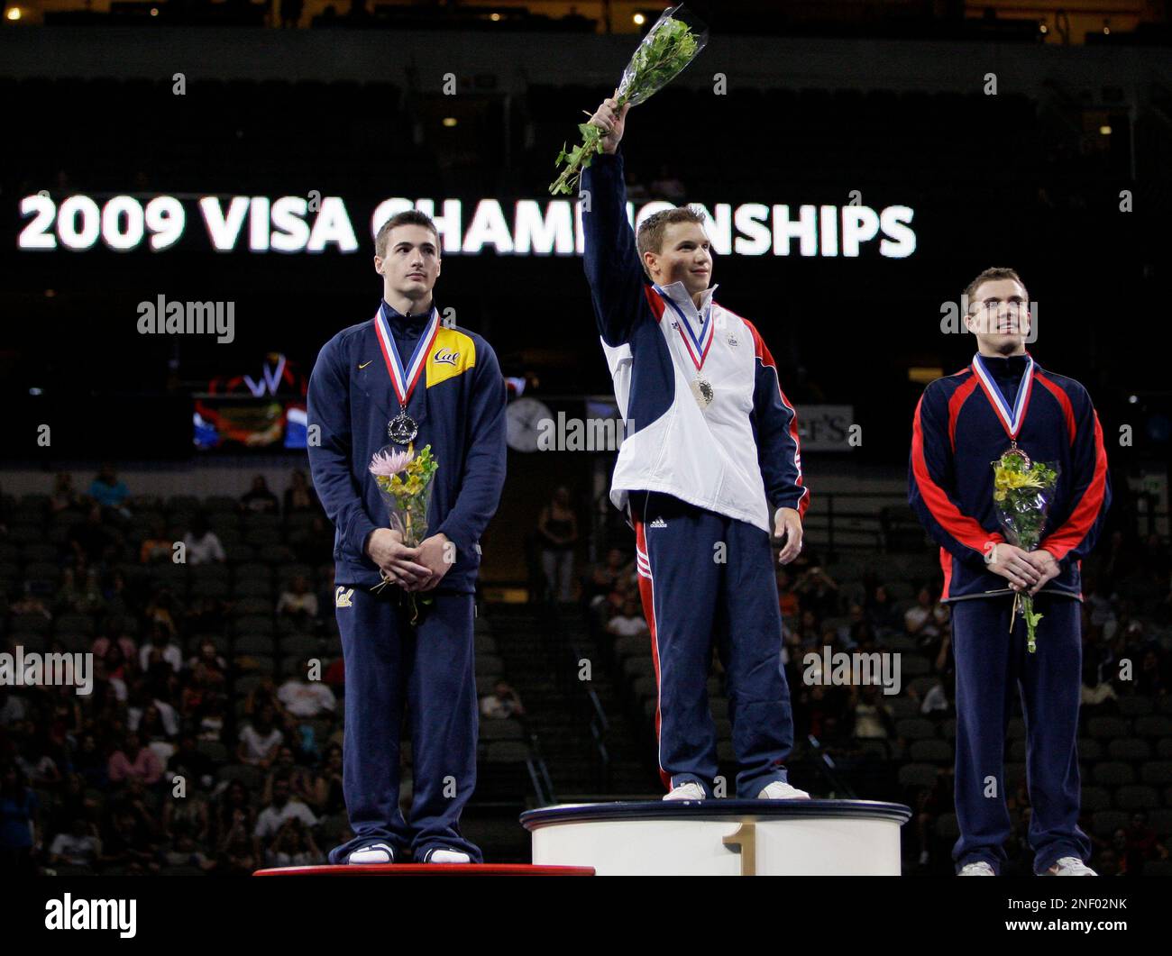 Jonathan Horton, center, acknowledges cheers from fans as he, Tim ...