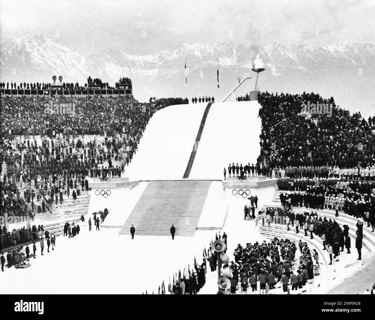 The Olympic Flame burns above the Bergisel Stadium, Innsbruck, Austria ...