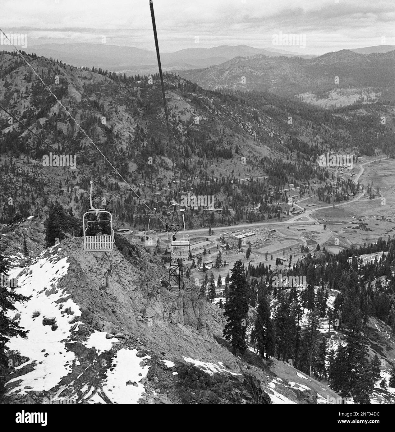 Ski lifts rising from the 8,200 foot valley floor to the 9,000 foot ...