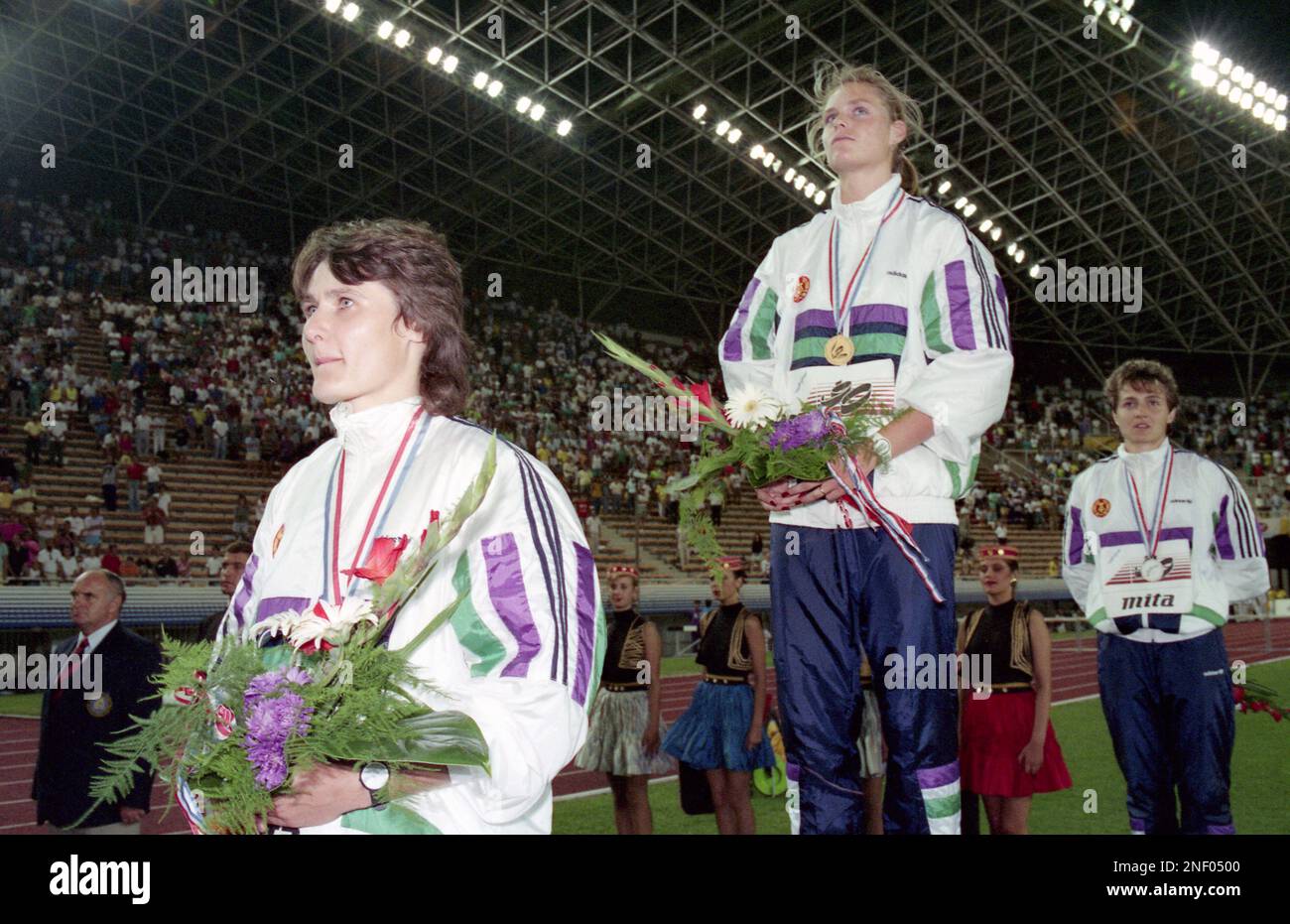 Three East German sprinters Katrin Krabbe (1st), center, Silke Moeller ...