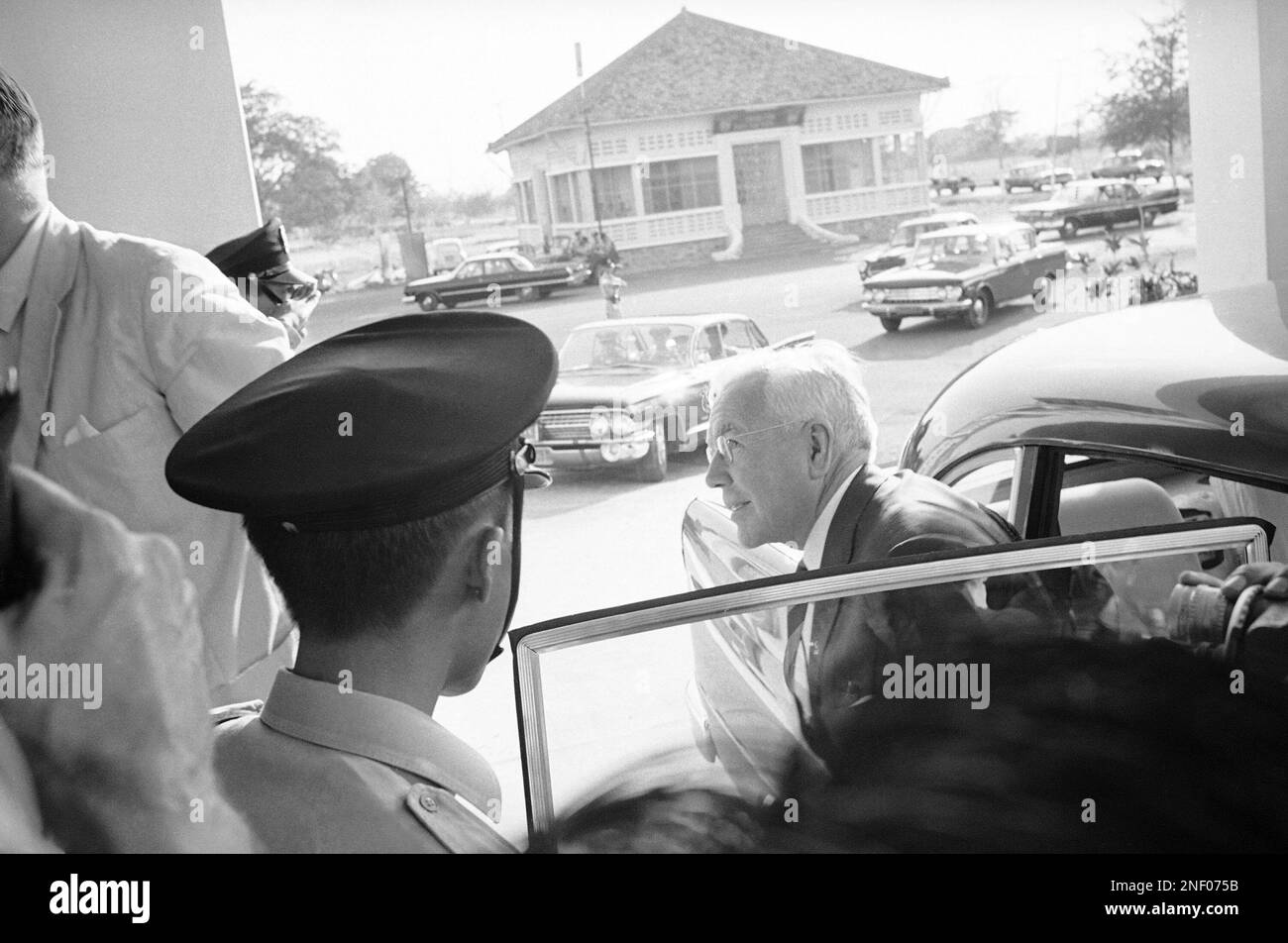 John A. McCone, CIA director, arrives at Vietnamese headquarters joint ...