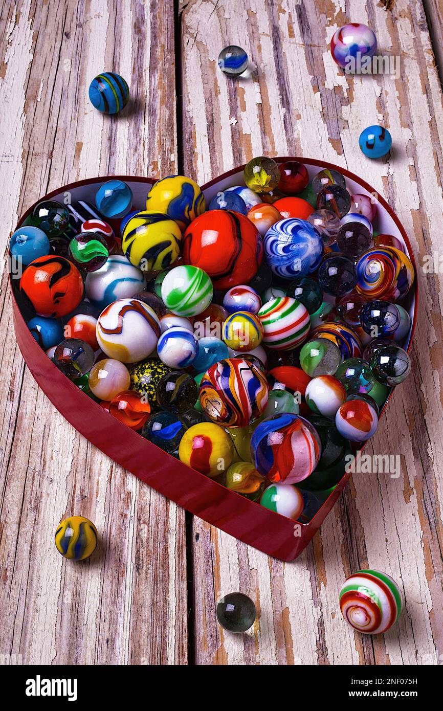 Children playing vintage marbles hi-res stock photography and images ...