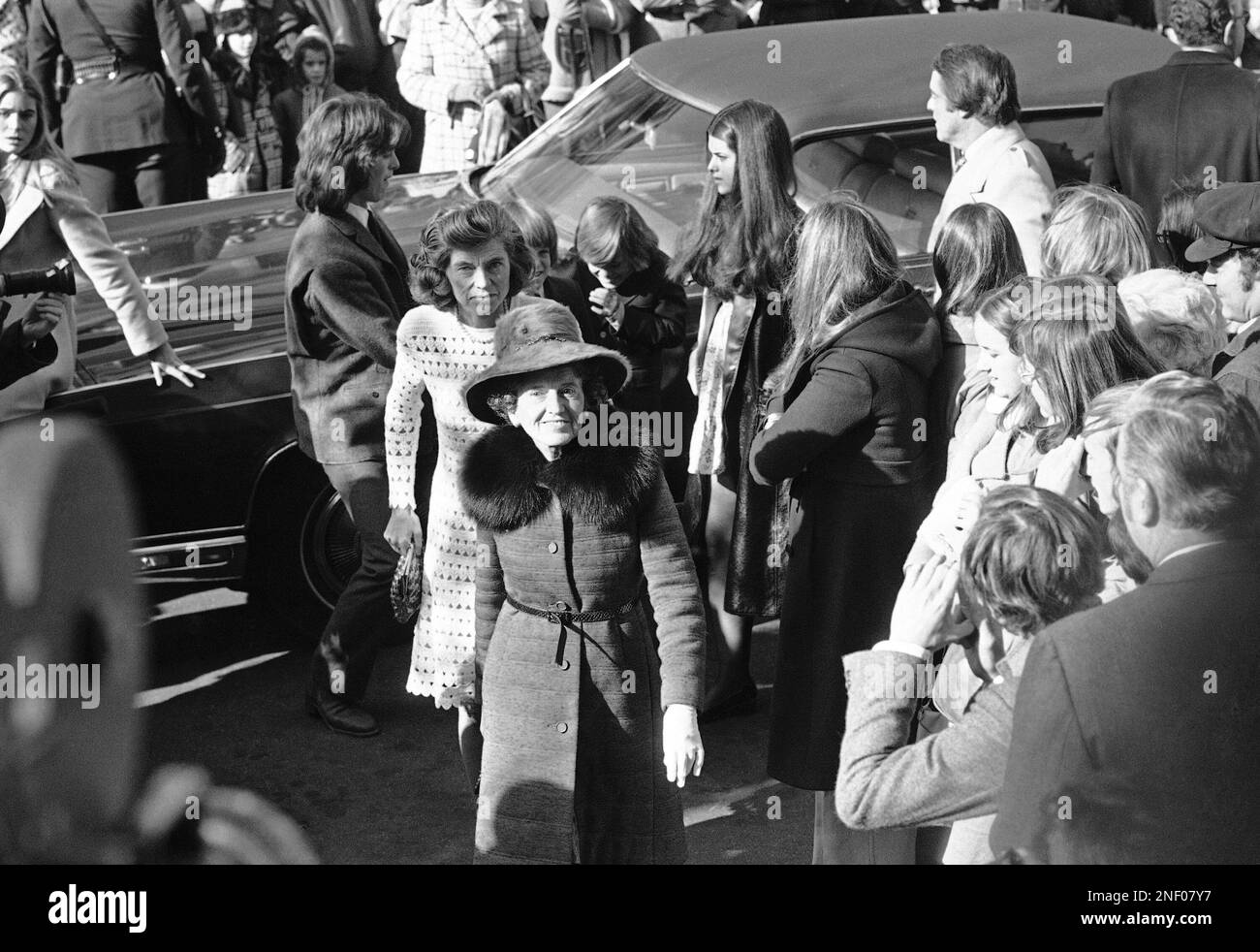Mrs. Rose Joseph Kennedy walks to the steps of Holy Trinity Church is ...