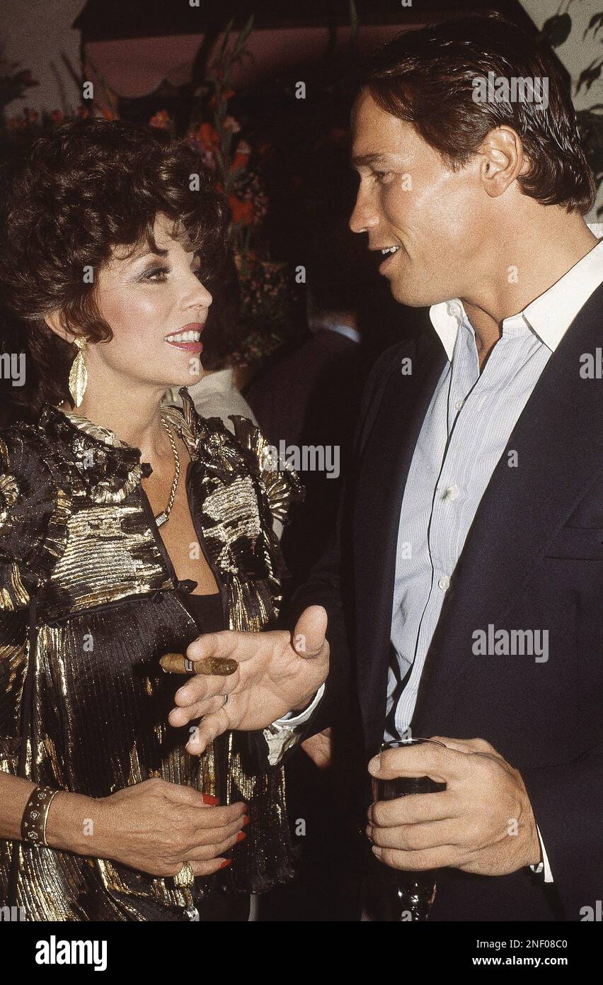 Actress Joan Collins is shown with Arnold Schwarzenegger, April 8, 1984 ...