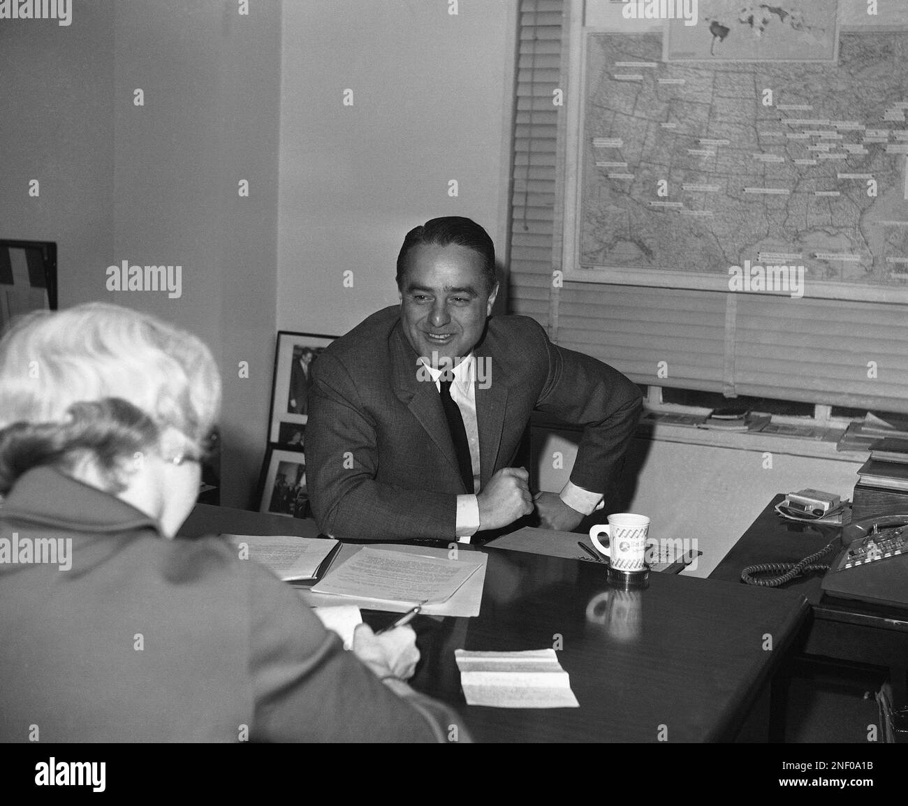 Peace Corps Director R. Sargent Shriver poses in his Washington office ...