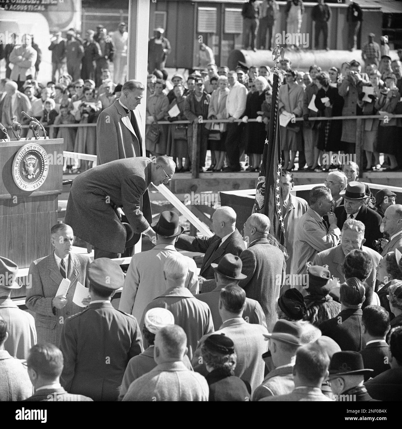 President Dwight Eisenhower shakes hands with Rear Adm. Sidney W ...