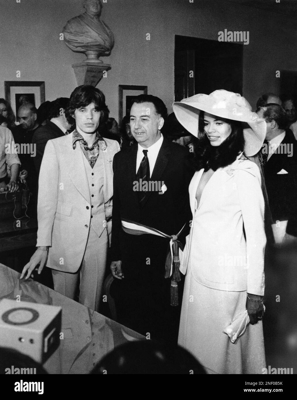 Mick Jagger, left, of the Rolling Stones, and his bride, the former ...
