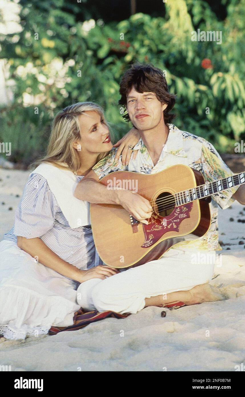 Rock musician Mick Jagger, right, is shown with pregnant girlfriend ...