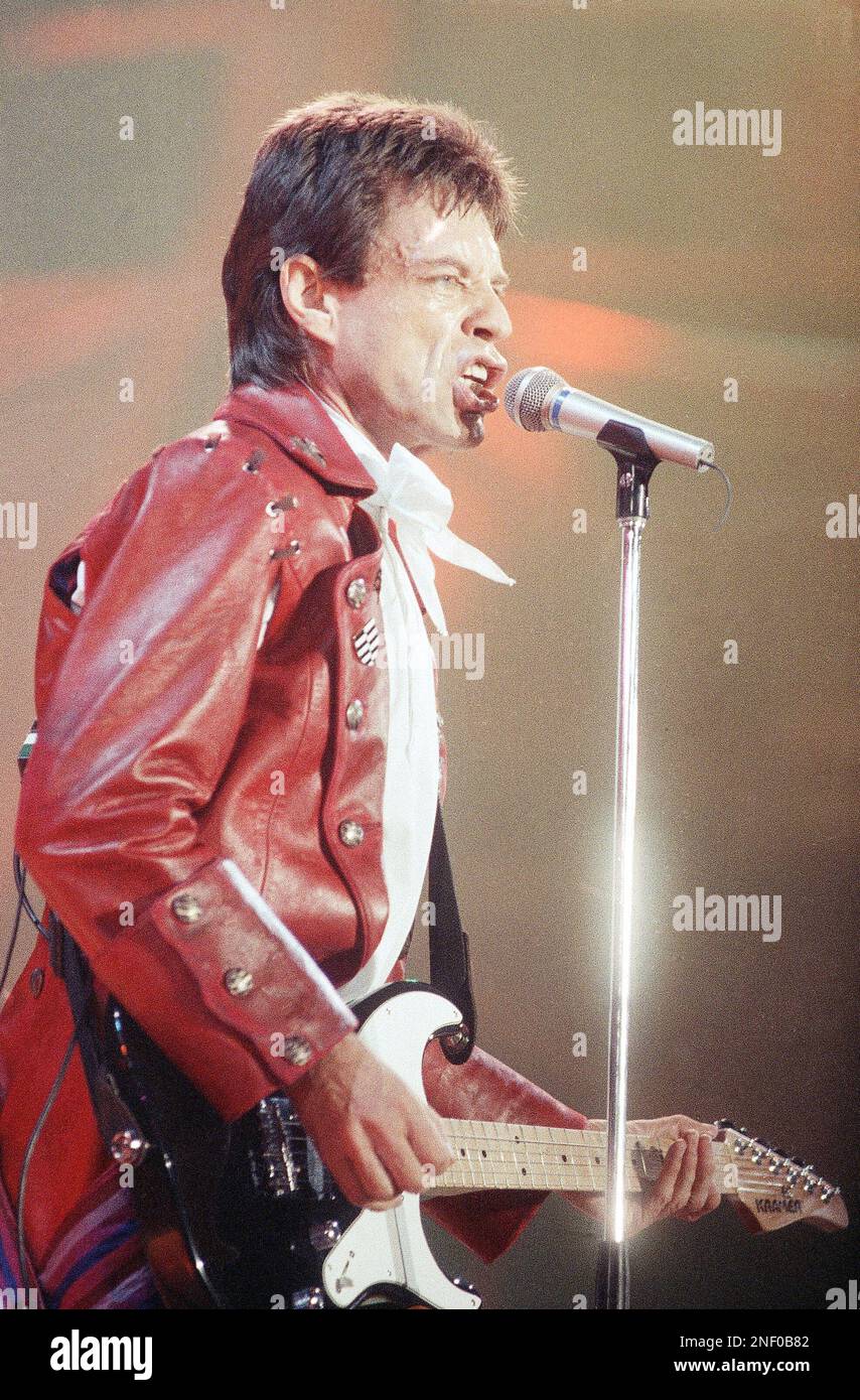 Mick Jagger lead singer of the Rolling Stones, is shown on stage ...