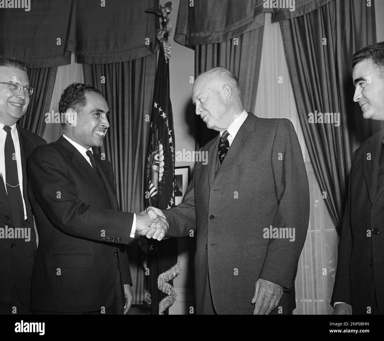 President Dwight Eisenhower shakes hands on Oct. 15, 1959 in Washington ...