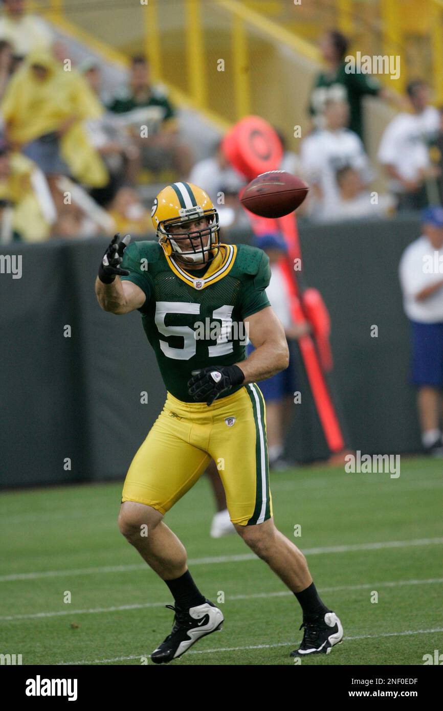 Green Bay Packers' Brady Poppinga makes a catch during a family night ...