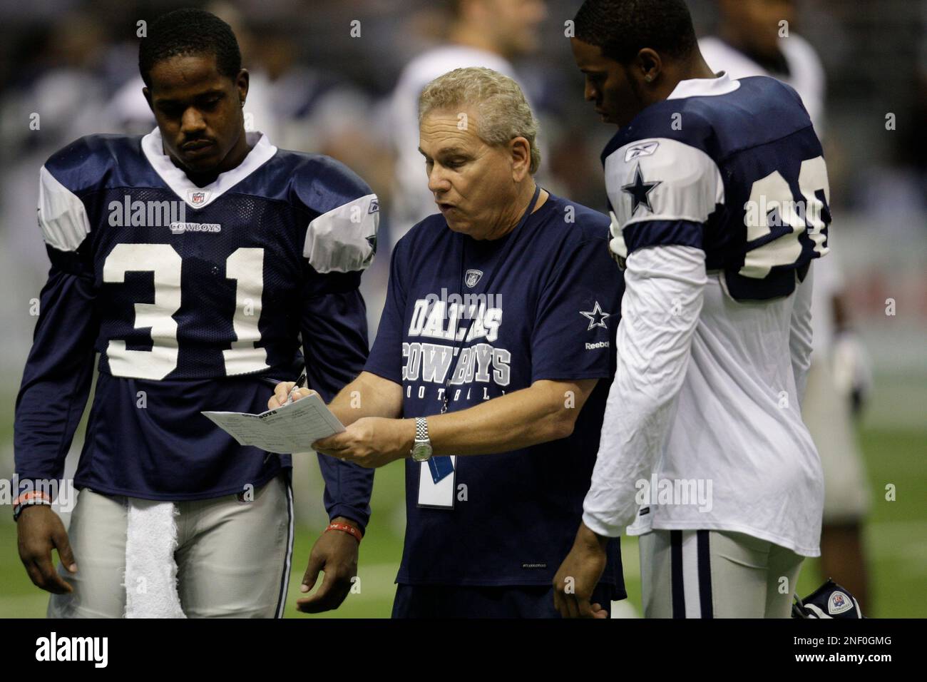Dallas Cowboys' DeAngelo Smith (31) and Alan Ball (20) talk with ...