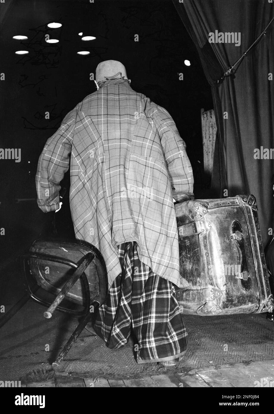 Grock, Europe's most famous clown, leaves the stage after giving his ...