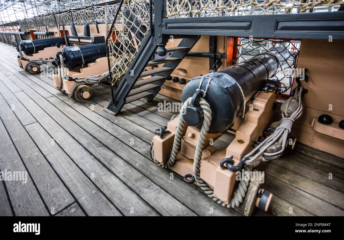 12-pounder guns on the deck of museum ship HMS Victory, Portsmouth ...