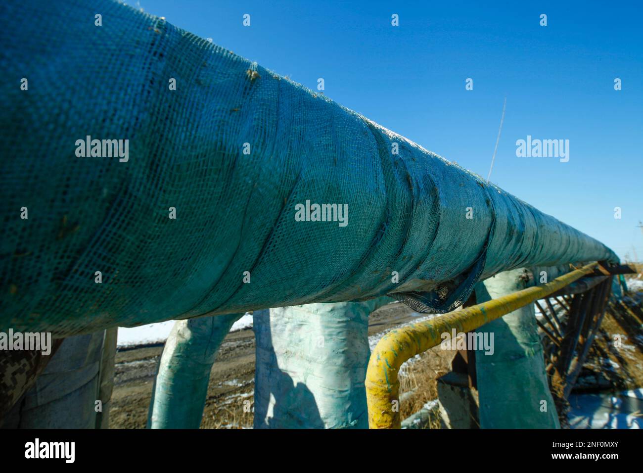 The pipe and valve oil fields Stock Photo - Alamy