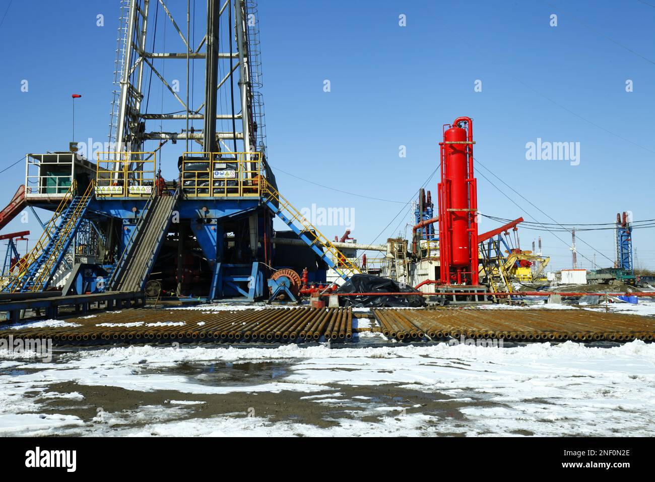 Oil drill pipe and drill Stock Photo - Alamy