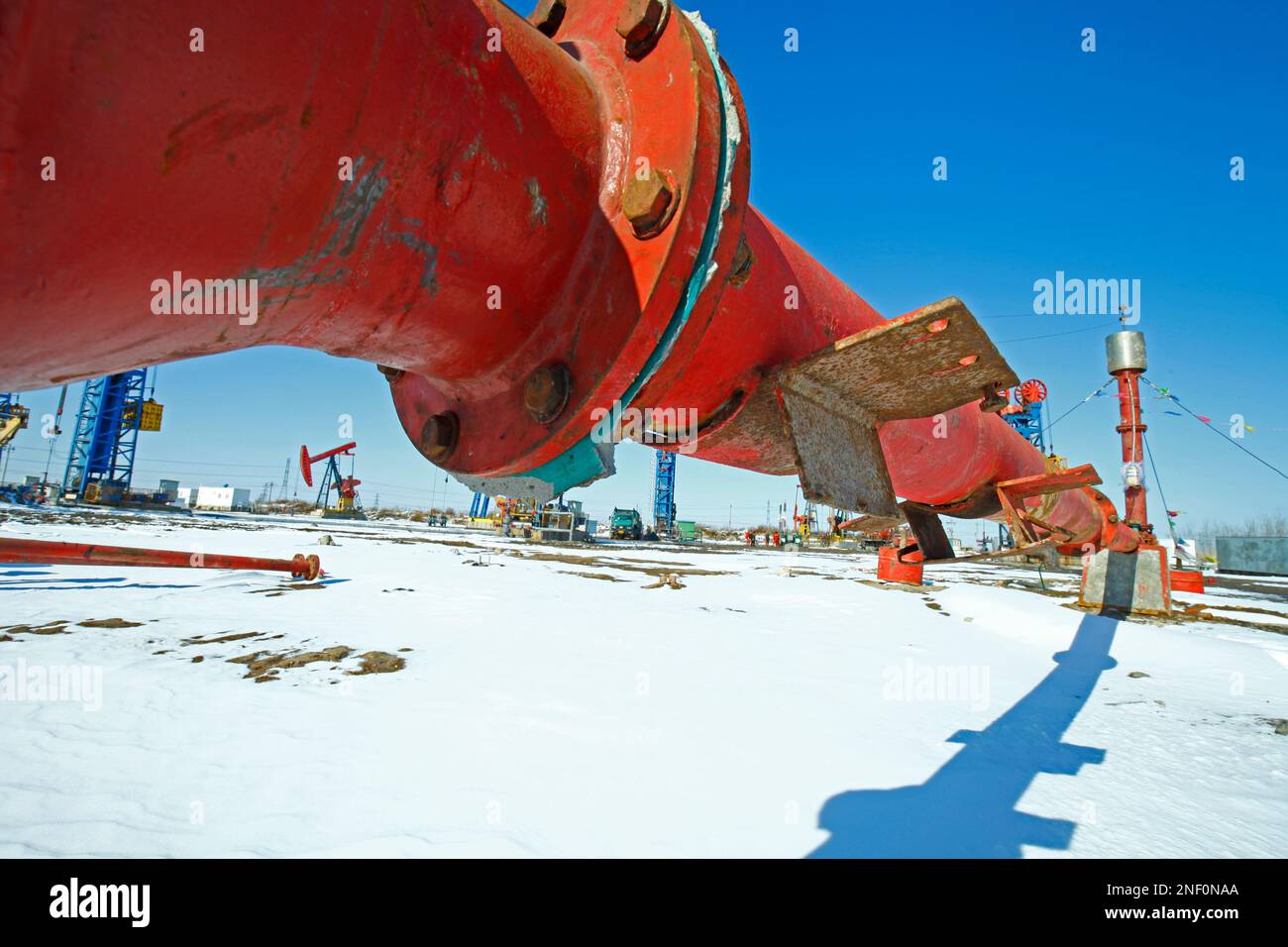 The pipe and valve oil fields Stock Photo - Alamy
