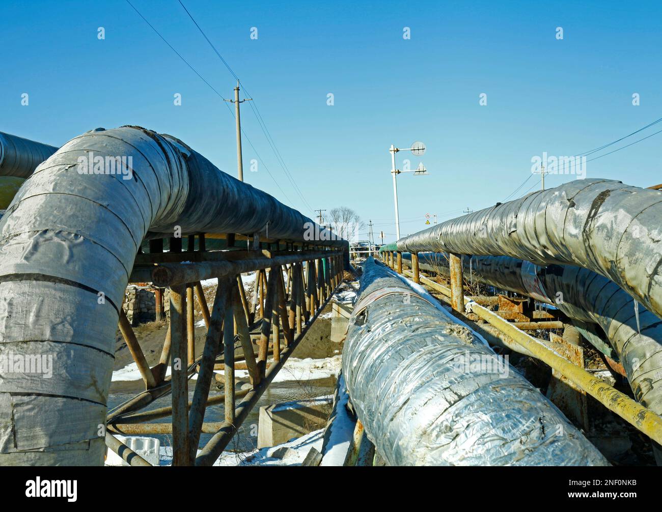 The pipe and valve oil fields Stock Photo - Alamy