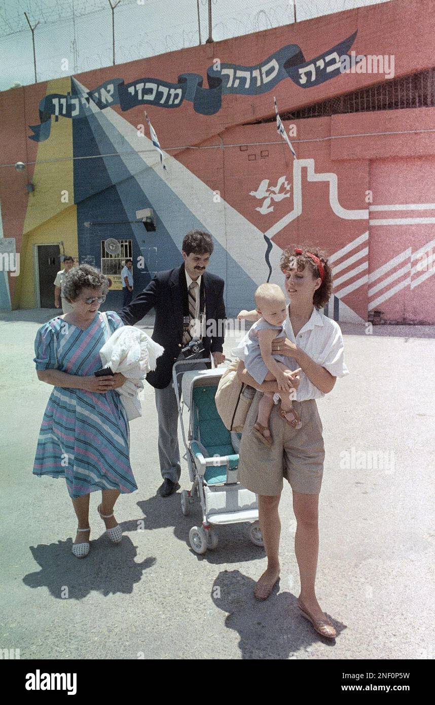 Mrs. Vera Demjanjuk with her daughter Irene (holding baby) and son in ...